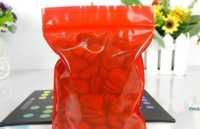 el sello reconectable a prueba de polvo del apretón de la prenda impermeable plástica del ziplock de la categoría alimenticia del LDPE del color rojo empaqueta