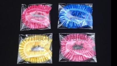casquillos de baño disponibles polivinílicos amarillos azules rosados claros coloreados el elástico de la cubierta de la peluquería del balneario del salón de belleza de la ducha