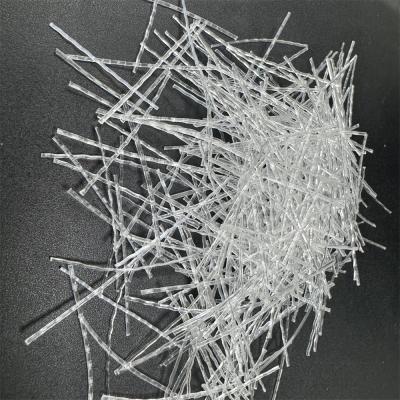China Aditivo de ingeniería civil de fibra macro de PP de forma de onda 24-60 mm para refuerzo de cemento y anti-carcaje en venta