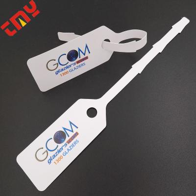China Custom PVC Hang Tag Die Cut Plastic Hang Tags Designs Fancy Round HD Printing Design for sale