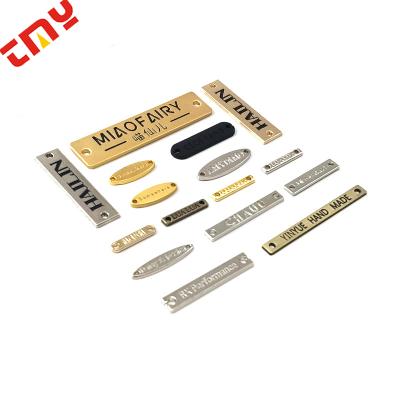 China Custom 2 Holes Engraved Metal Plate Logo, Sewing Zinc Alloy Brand Garment Label Metal Tags With Custom Logo For Clothing for sale