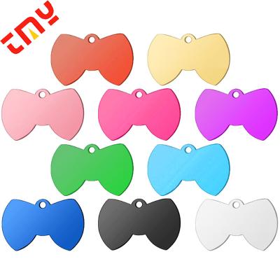 China Aluminium Bowknot Shape Blank Dog Tag With Metal Print Custom Pendant And Color for sale