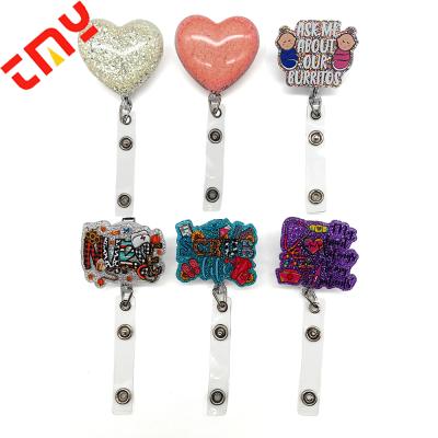 China Custom Funny Cartoon Glitter Sparkle Charms Medical Retractable Beaded Badge Reel Toppers Nurse Acrylic Flatback for Badge Reels for sale