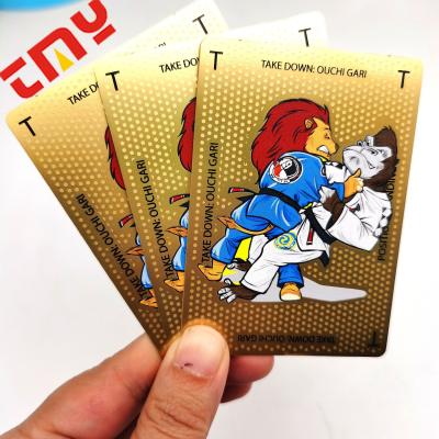 China New Edition Wholesale Customized Anime Cartoon Gold Stainless Steel Metal Playing Card for sale