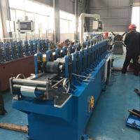 China Shutter Door Roll Forming Machine PLC Control 70mm Shaft 12m/min for sale