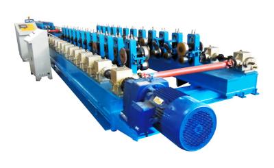China Gear Box Driving Door Frame Roll Forming Machine with Two Output Tables for sale