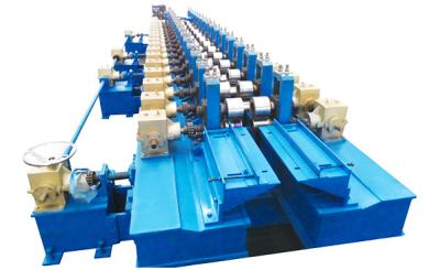 China Gear Box Driving Door Frame Roll Forming Machine with Two Output Tables for sale