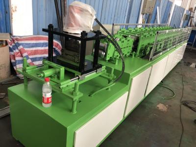 China 2 In I Metal Shutter Slat Roll Forming Machine With 10-12 Meters/Min Working Speed for sale