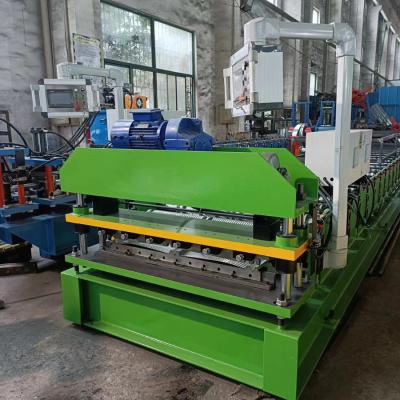 China Chile 26gauge 29gauge Painted Steel Zinc-Alum 5v Crimp Residential Metal Roofing Panels Roll Forming Machine for sale