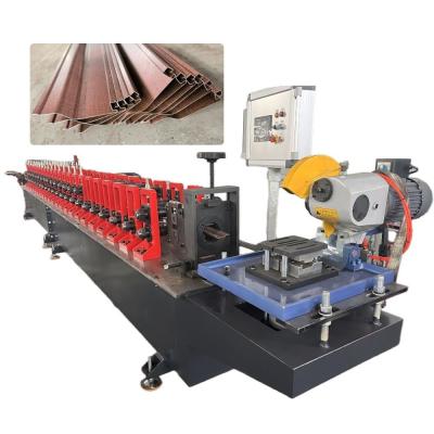 China 0.7-1.2mm Thickness Galvanized Metal Steel Rolling Shutter Door Bottom Slat Roll Forming Machine with Saw Cutting for sale