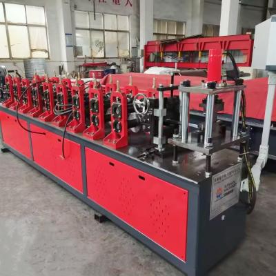 China 0.6-1.2mm PPGI V Shaped Steel Rack Mesh Deck Roll Forming Machine for sale