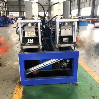 China 2 en una máquina U C Stud Track Furring Channel Omega Profile Doble fila de acero ligero máquina de moldeado de rollos de quilla en venta