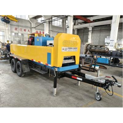 China 0.4-0.7mm Color Steel Trailer Portable Type SSR Plus Kr18 Panel Forming Machine For Solar Panel for sale