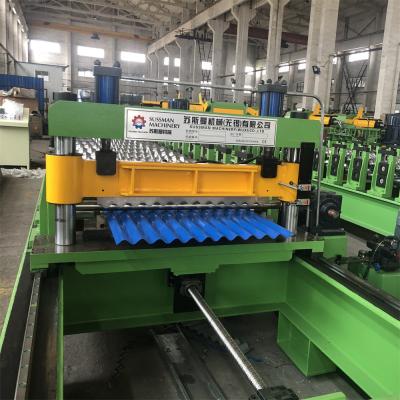 China 1250mm Feeding Width  Servo Cutting Roof Panel Roll Forming Machine for sale