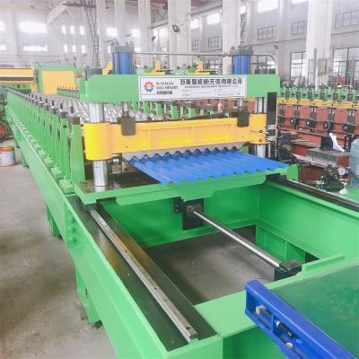 China 1250mm Feeding Width  Servo Cutting Roof Panel Roll Forming Machine for sale
