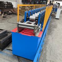 China Shutter Door Roll Forming Machine PLC Control 70mm Shaft 12m/min for sale