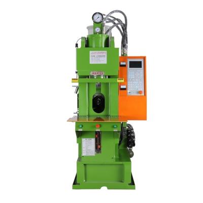China ABS PP C Type Vertical Injection Moulding Machine For Electric Power Plug for sale