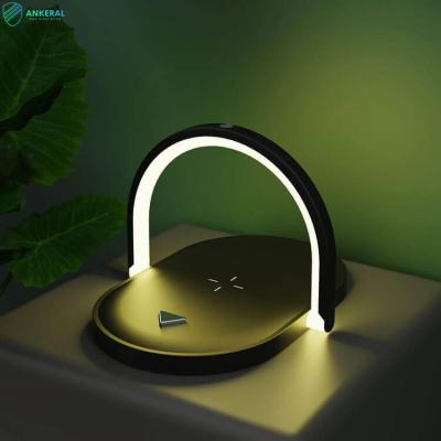 China New Launched Quality 15W 10W 5W Fast Wireless Charger with Cool Design Night Light Phone Holder for sale