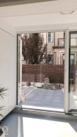 China Manual Retractable Sliding Door with 1.2mm Square Frame Profile for sale