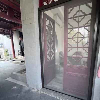 Cina Anti Mosquito Net Low Track Retractable Screen Door Custom Barrier Free Insect Fly Screen Door Fiberglass in vendita