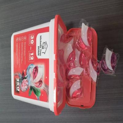 China 12g Red Pomegranate Scented Washing Machine Laundry Detergent Pods Plastic Box Package for sale