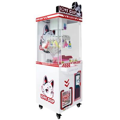 China Factory Wholesale Clip Claw Coin Operated Arcade Game Prize out Vending Machine Gift Prize Clip Machine for sale