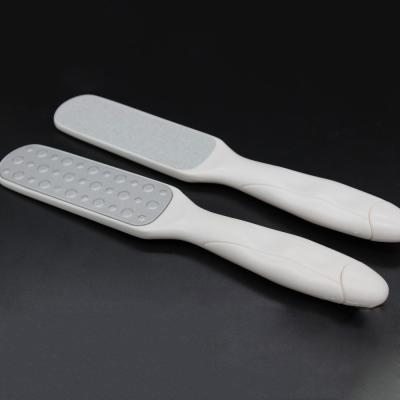 Cina Lima per calli per piedi in metallo con manico per la rimozione della pelle morta in vendita