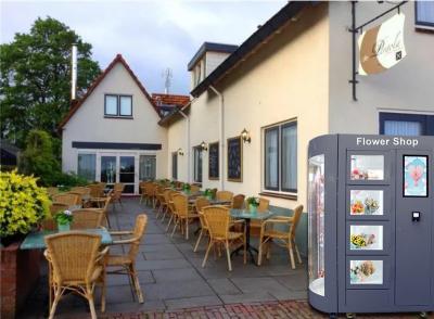 Chine Affichage à cristaux liquides adapté aux besoins du client viseur de Rose Bouquets Vending Machine With de fleur de 19 pouces à vendre