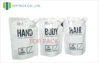 中国 ホイルの物質的なプラスチックは液体のシャンプーのための口が付いている袋を立てます 販売のため