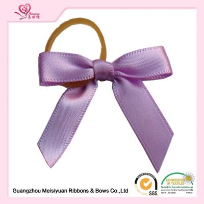 Cina 7 * 7cm in tutto colorano gli archi elastici dei nastri/il poliestere elastico 100% dei legami capelli del nastro in vendita