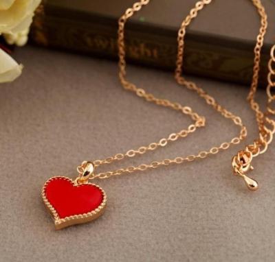 China Collares pendientes de la cadena del suéter de la moda en forma de corazón en venta