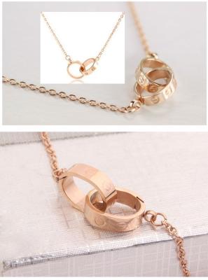 China El oro color de rosa del collar pendiente de acero titanium de la joyería de las mujeres de la moda plateó el collar de los anillos en venta
