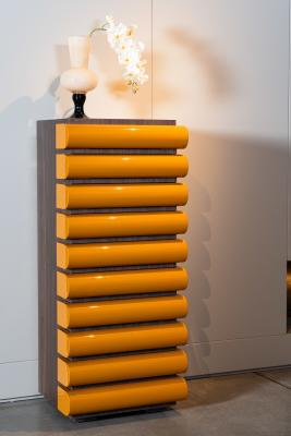 China Custom Luxury Tall Bedside Table With Sculptural Cylindrical Drawers And Glossy Yellow Finish for sale