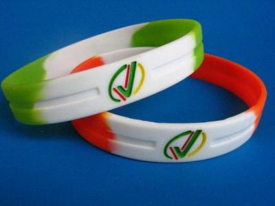 China subsection silicone bangle debossed logo with filling color for sale
