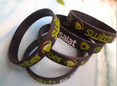 China Etisalat black silicone wristbands for sale