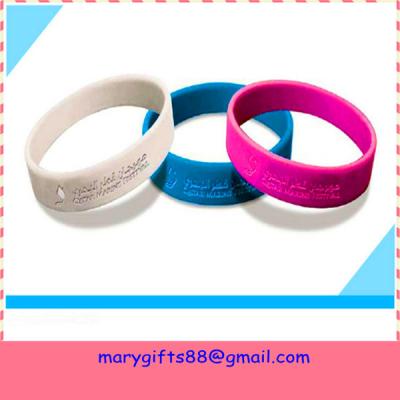 China fashion round debossed silicone rubber bangles for sale