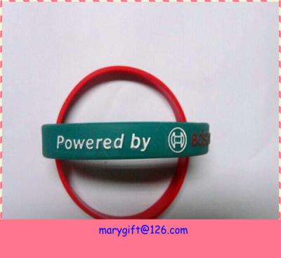 China custom adjustable silicone wristband with embossed logo for sale