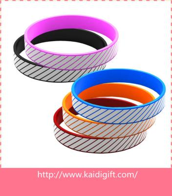 China silicone bracelet with charm silicone wristband debossed color filled for sale