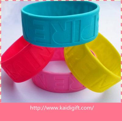 China wide one inch debossed silicone wrist band without color for sale