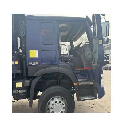 Cina 2024 Camion usato HOWO Camion pesante 6X4 Camion spazzatura con 2 numeri di cambio inverso in vendita