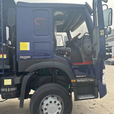 Cina 2024 Camion usato HOWO Camion pesante 6X4 Camion spazzatura con 2 numeri di cambio inverso in vendita