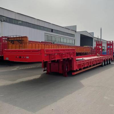 China 60T Max Payload Steel Container Chassis Loader Lowbed Truck Low Platform Semi-Trailer for sale