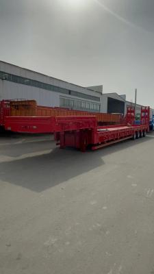 China 60T Max Payload Steel Container Chassis Loader Lowbed Truck Low Platform Semi-Trailer for sale