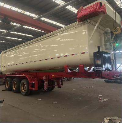 China Semi-reboque traseiro para transporte de areia e cascalho de aço pesado à venda