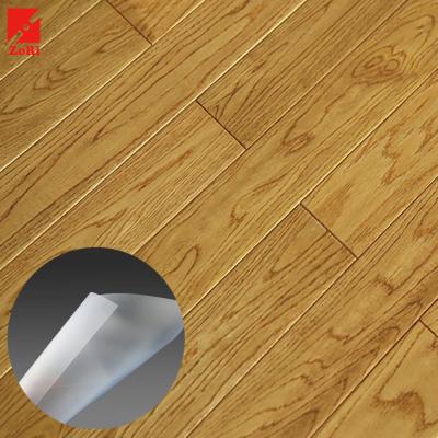 China Goedkwaliteit 0.2mm 0.3mm Puur PVC Transparante slijtvast laag Fabrikanten voor vloeren Te koop
