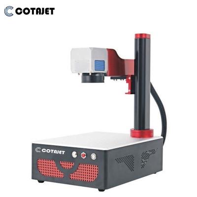 Cina COTAJET Macchina di marcatura laser portatile 20W 30W 50W 100W Macchina di codifica della data di scadenza in vendita