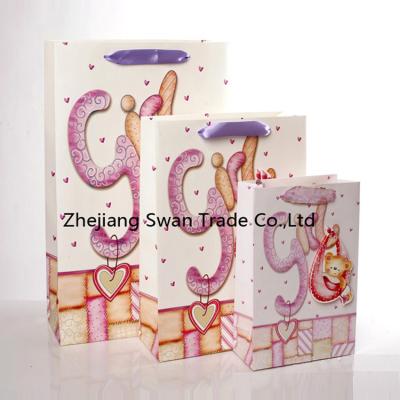 China cute design girls paper gift bag with ribbon handle customized printing available for sale