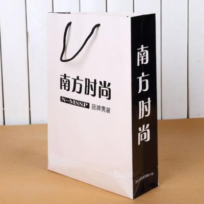 China white medium size fashion clothing paper packing bags with brand logo printed for sale