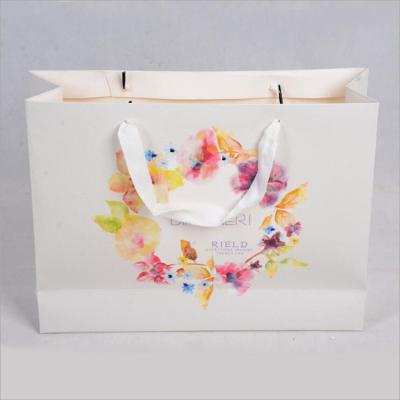 China white cardboard paper gift bags with custom artwork printing for shopping for sale