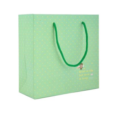 China custom full-color printed white cardboard large gift paper bags for shopping for sale